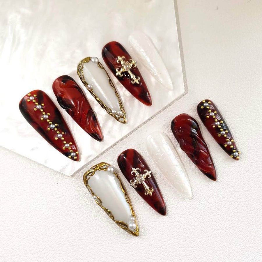 Ruby Regalia: Luxe Chrome Stiletto Nails